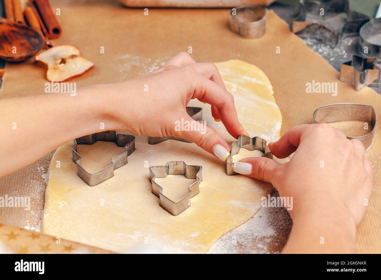 female hands making cookies from fresh dough at home Stock Photo - Alamy