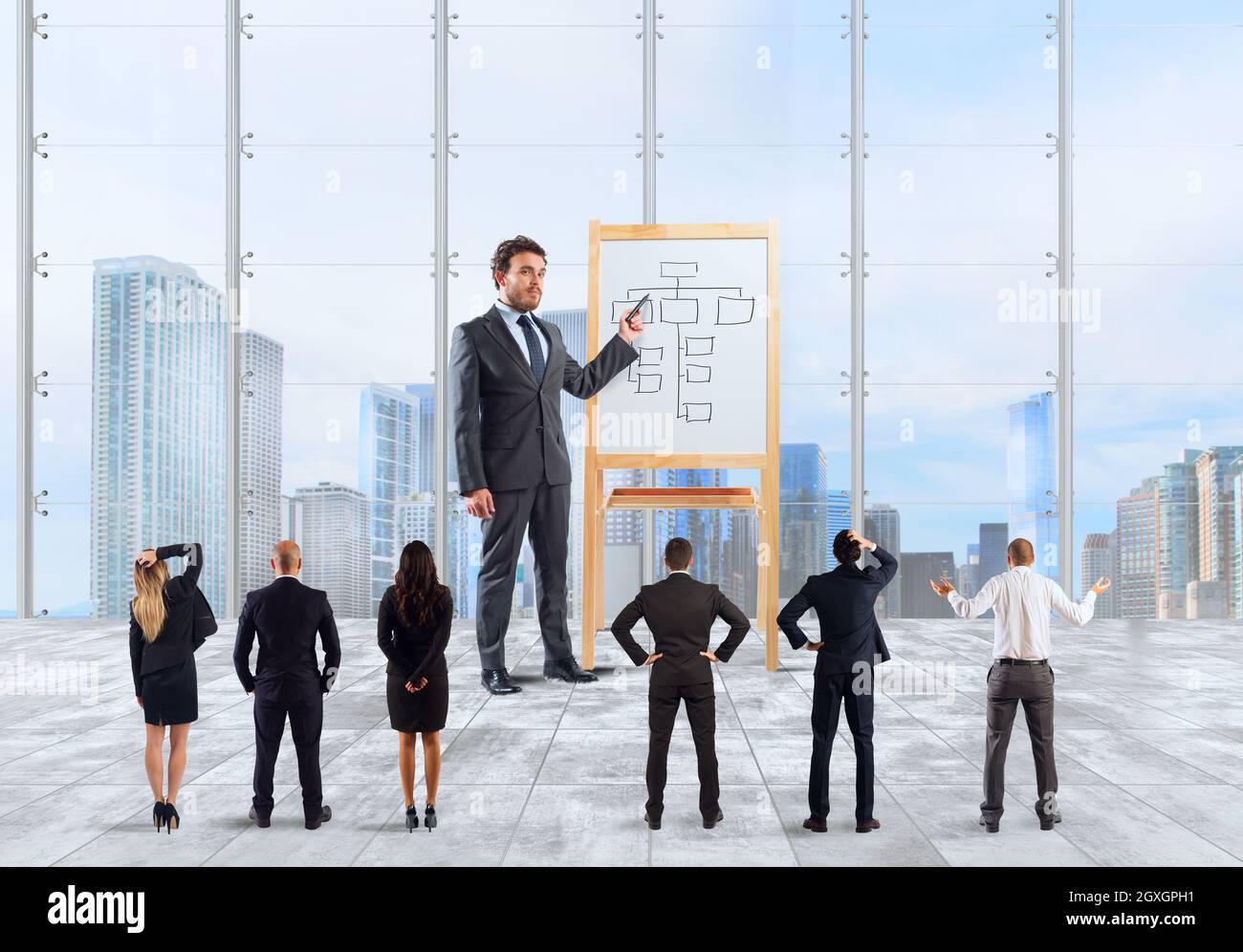 Businessman as a leader and boss explain business strategy to his ...