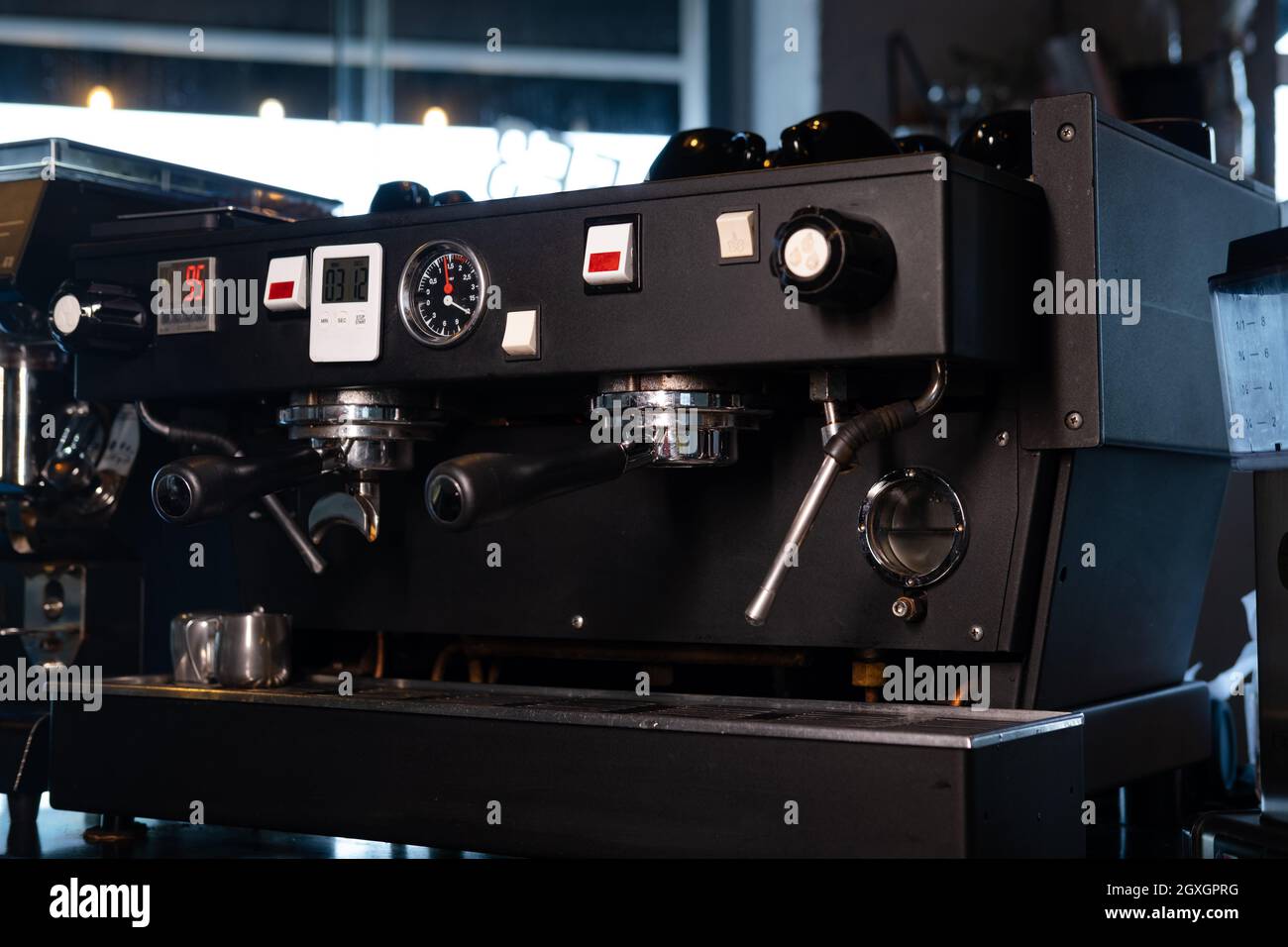 close up of a professional coffee machine. loft dark coffee shop Stock ...
