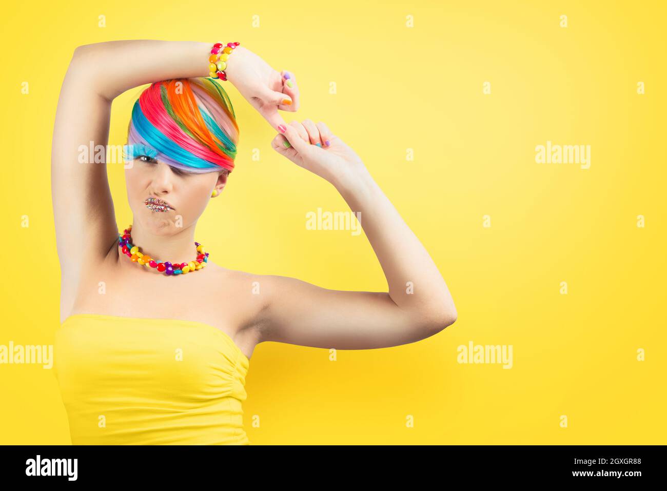 Colorful fashion makeup with rainbow color accessories Stock Photo - Alamy