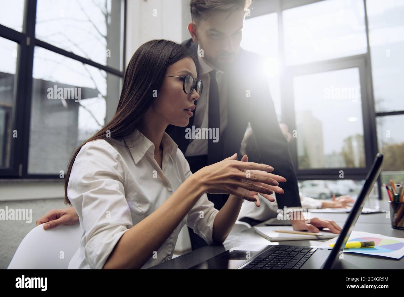 Business person in office connected on internet network with a computer ...