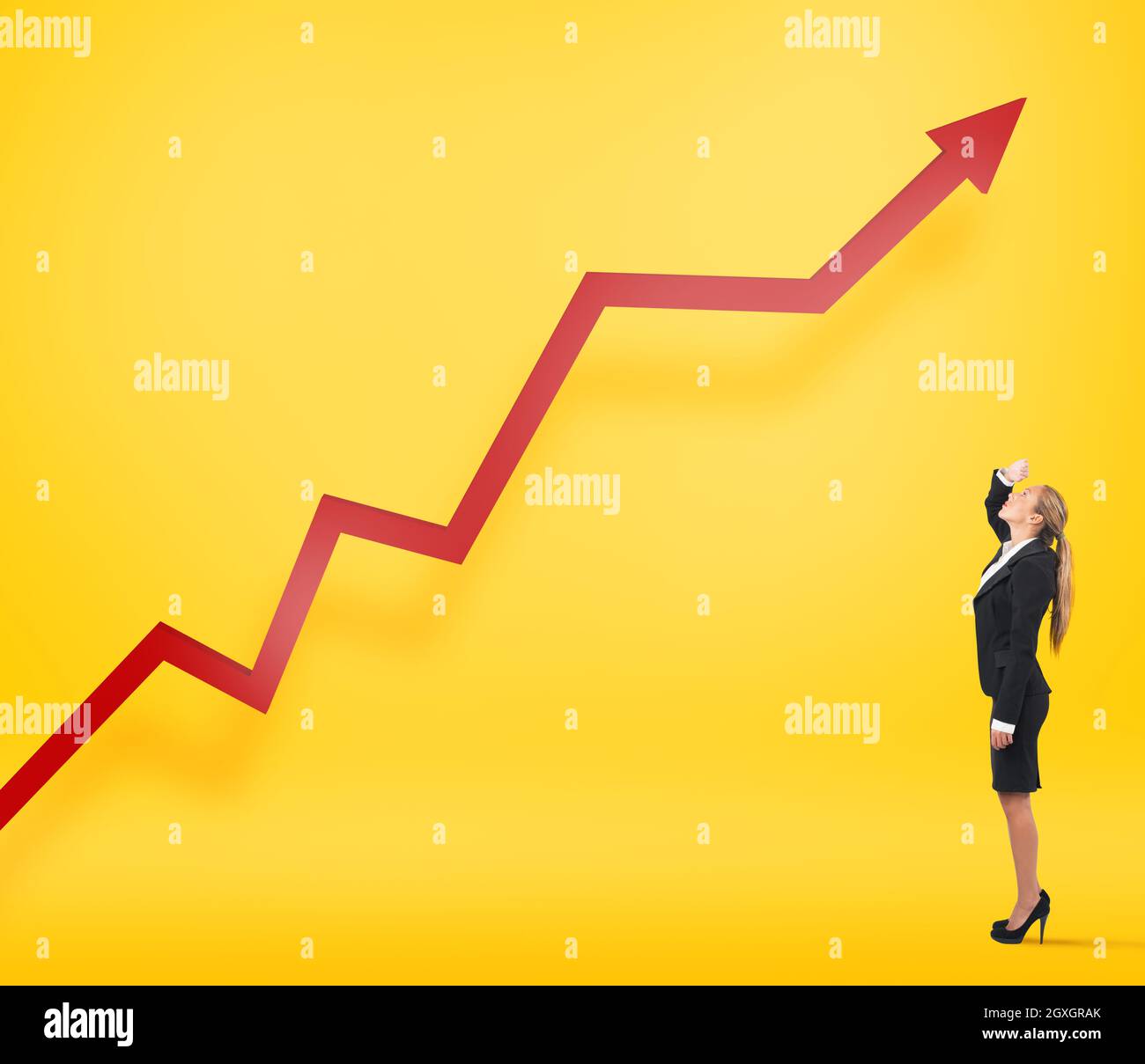 Businesswoman watches her company statistic grow up fast Stock Photo ...