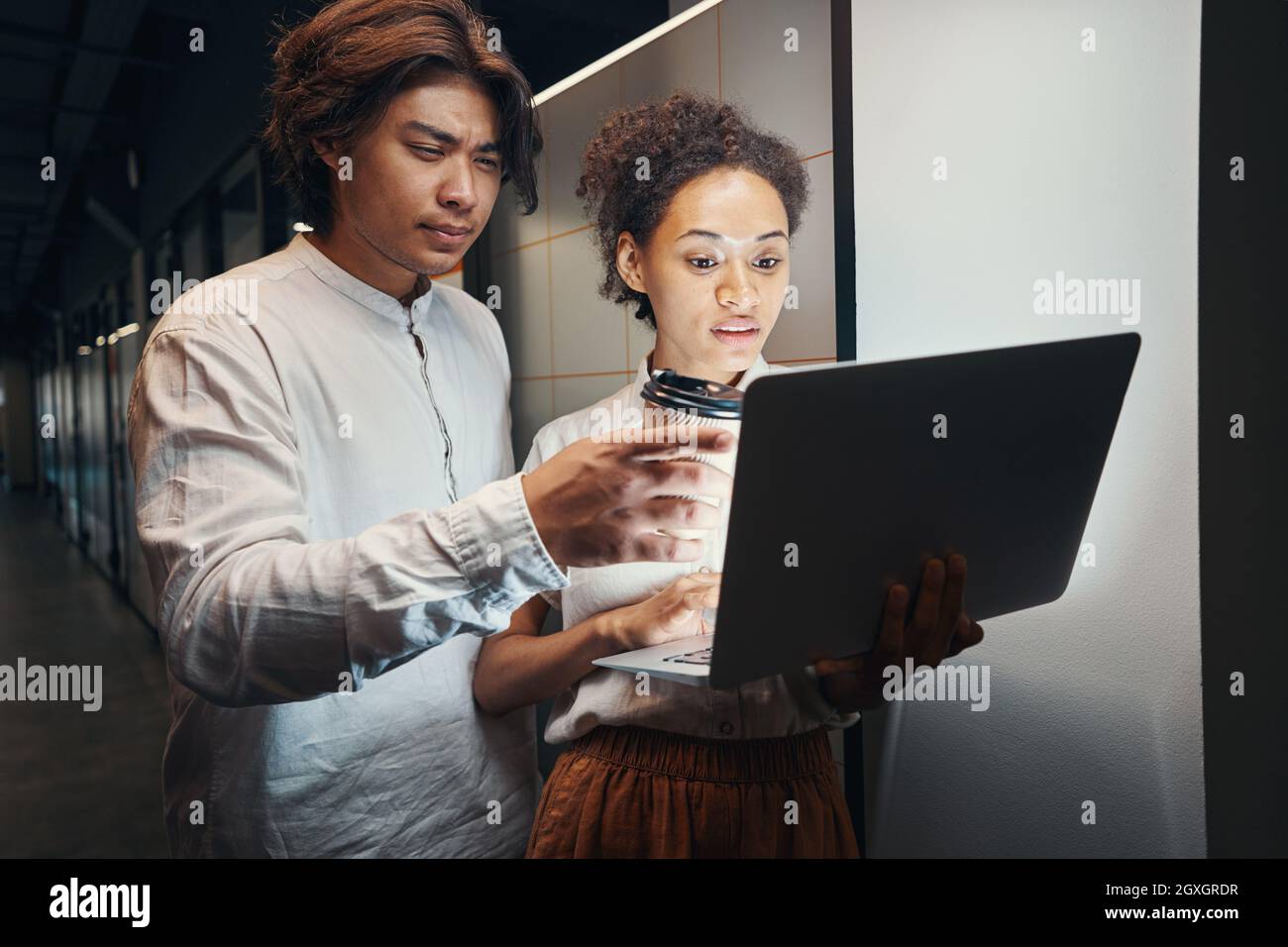 Employees are spending break together on job Stock Photo - Alamy