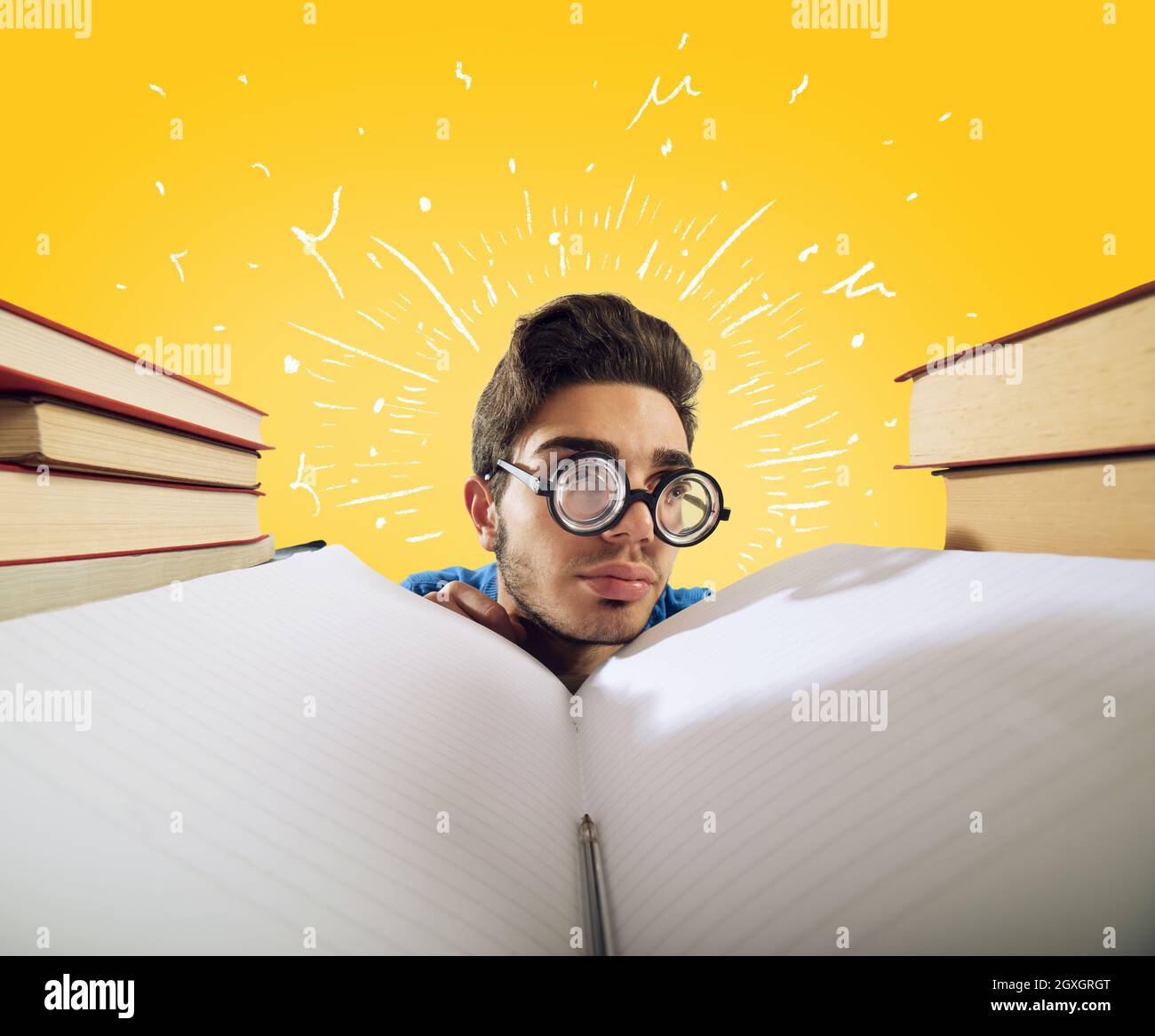Young Exhausted Student is studying hard on the desk Stock Photo - Alamy