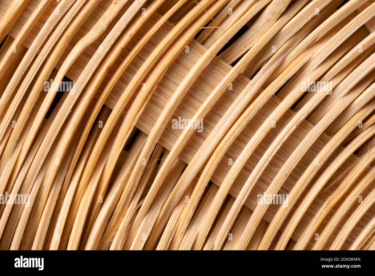 Close-up of a part of a circular object made by weaving thinly sliced ...