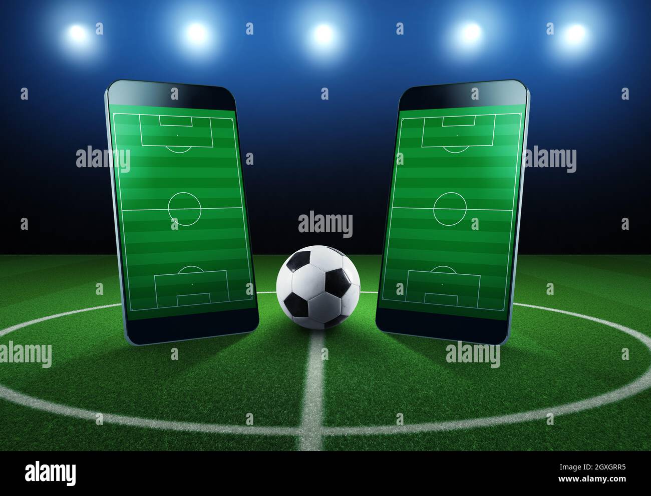 Cellphone and ball on a soccer field Stock Photo - Alamy