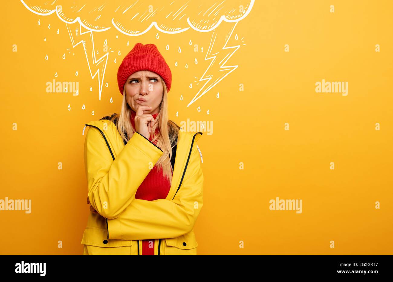 Blonde Girl thinks about negative things. Cloud, rain and lightning ...