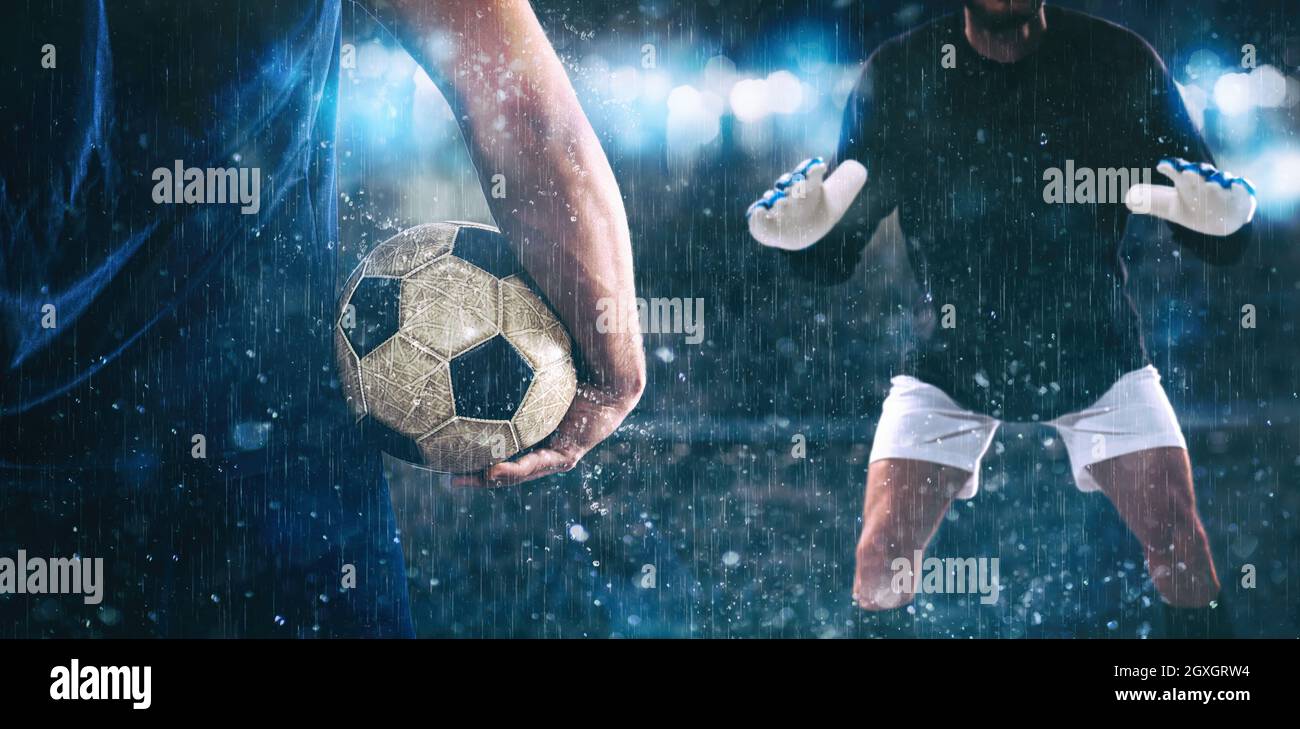 Challenge between the attacker and the goalkeeper of two opposing teams ...