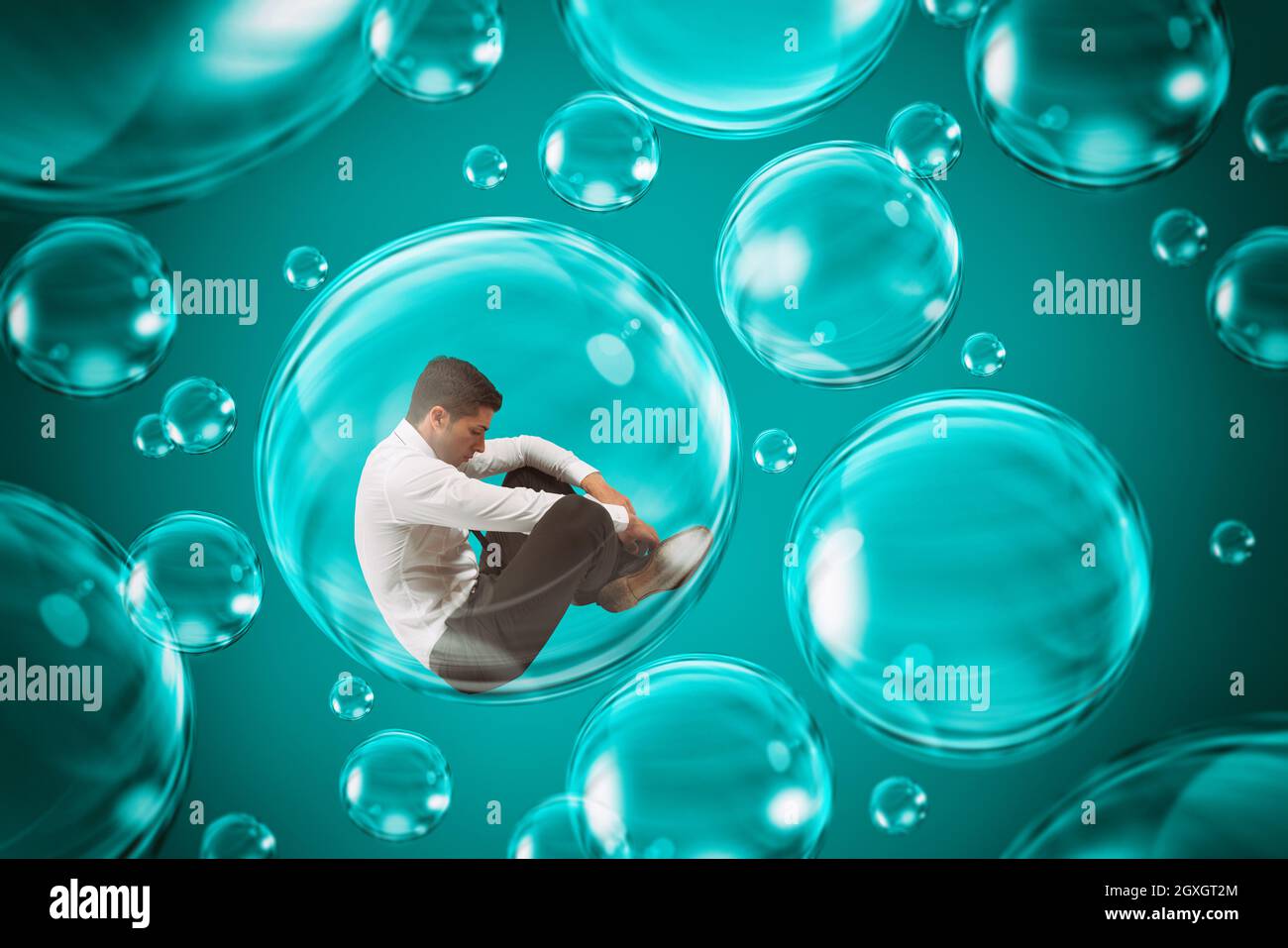 Sad businessman isolate himself inside a transparent bubble Stock Photo ...