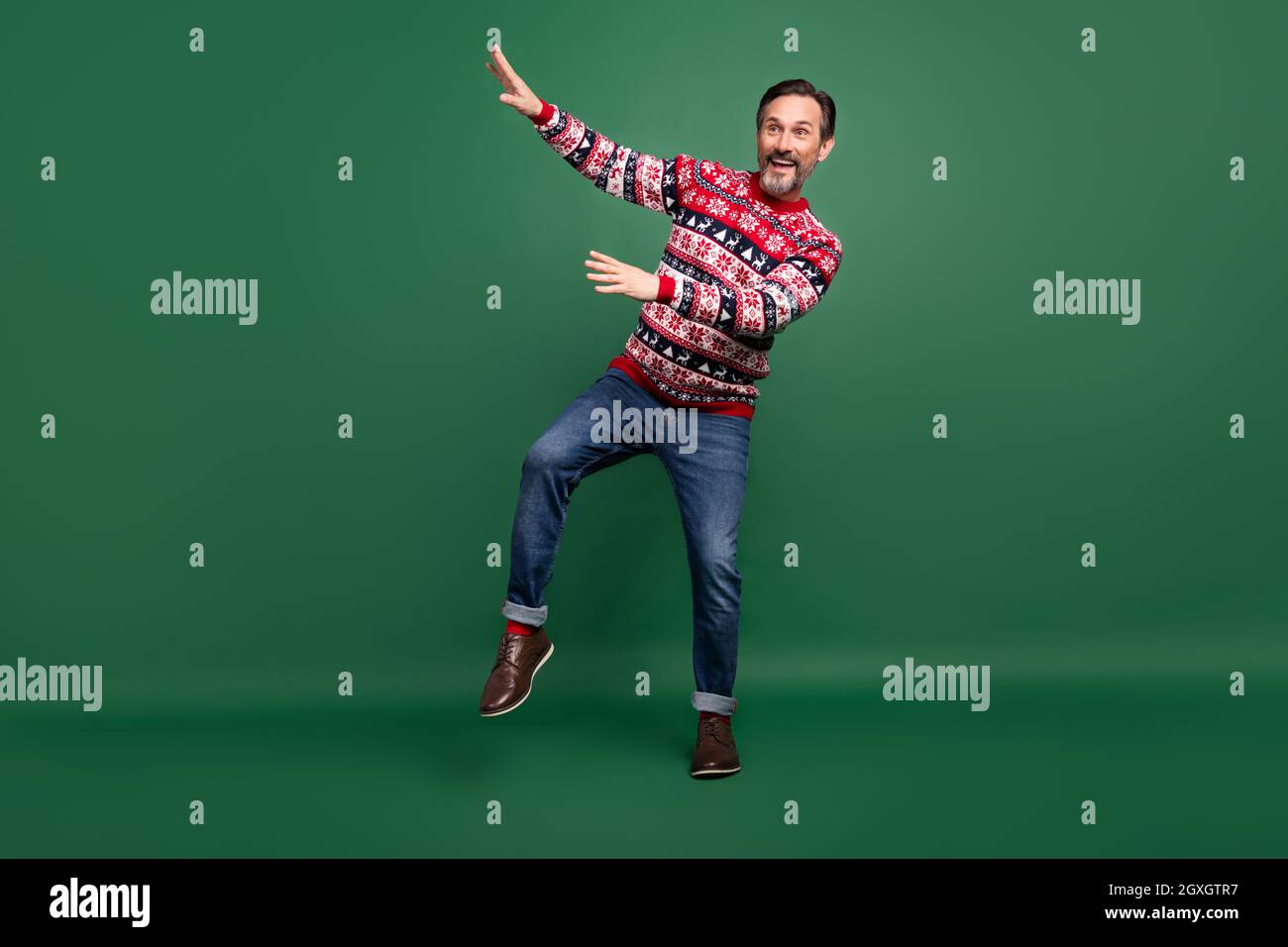 Full body photo of cool happy funky man look empty space dance enjoy ...