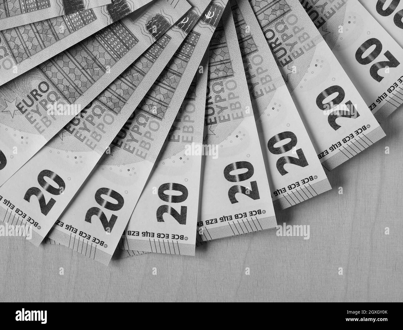 Euro banknotes and coins (EUR), currency of European Union in black and ...