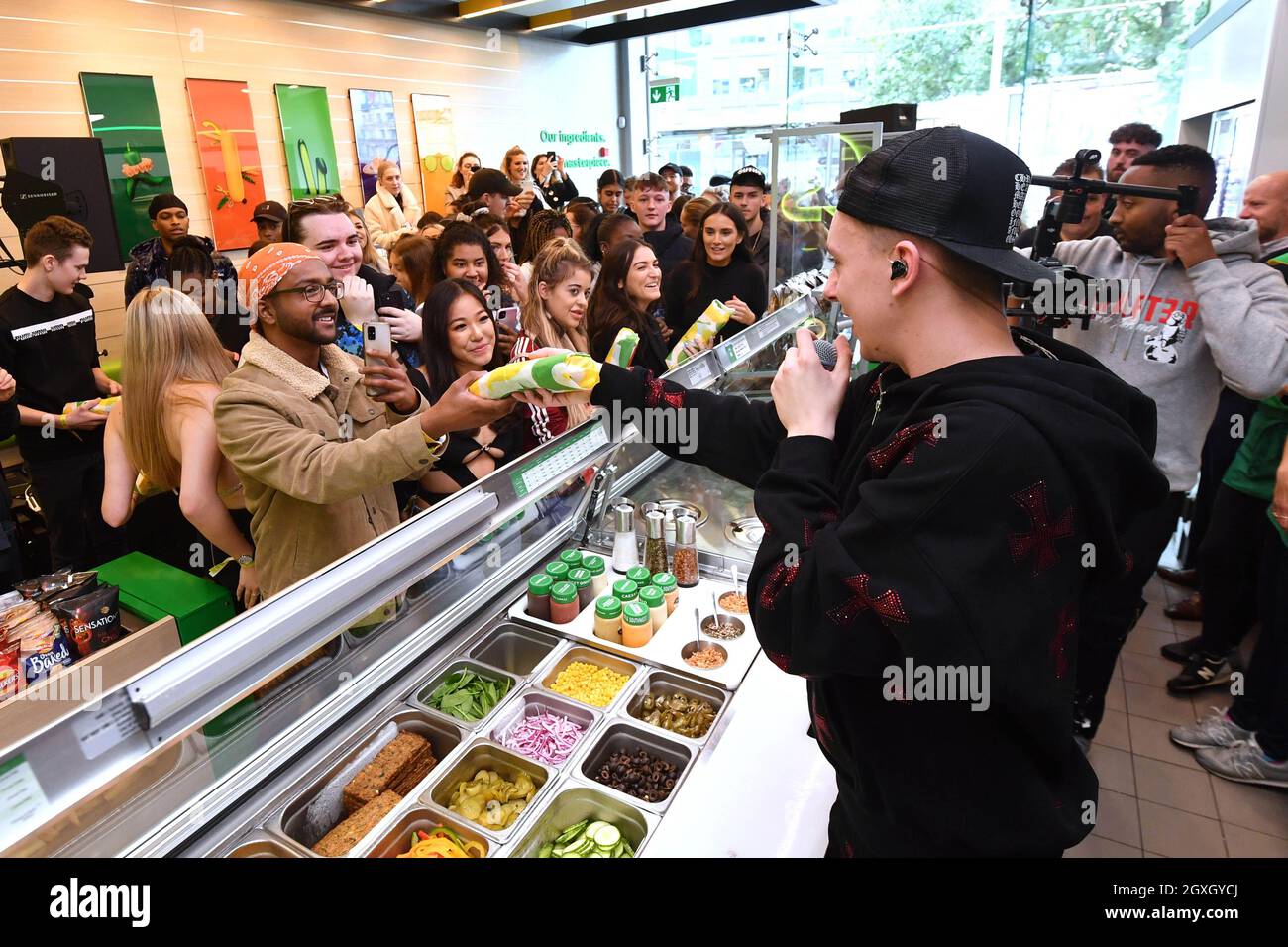 EDITORIAL USE ONLY Rapper Aitch meets fans before a surprise ...