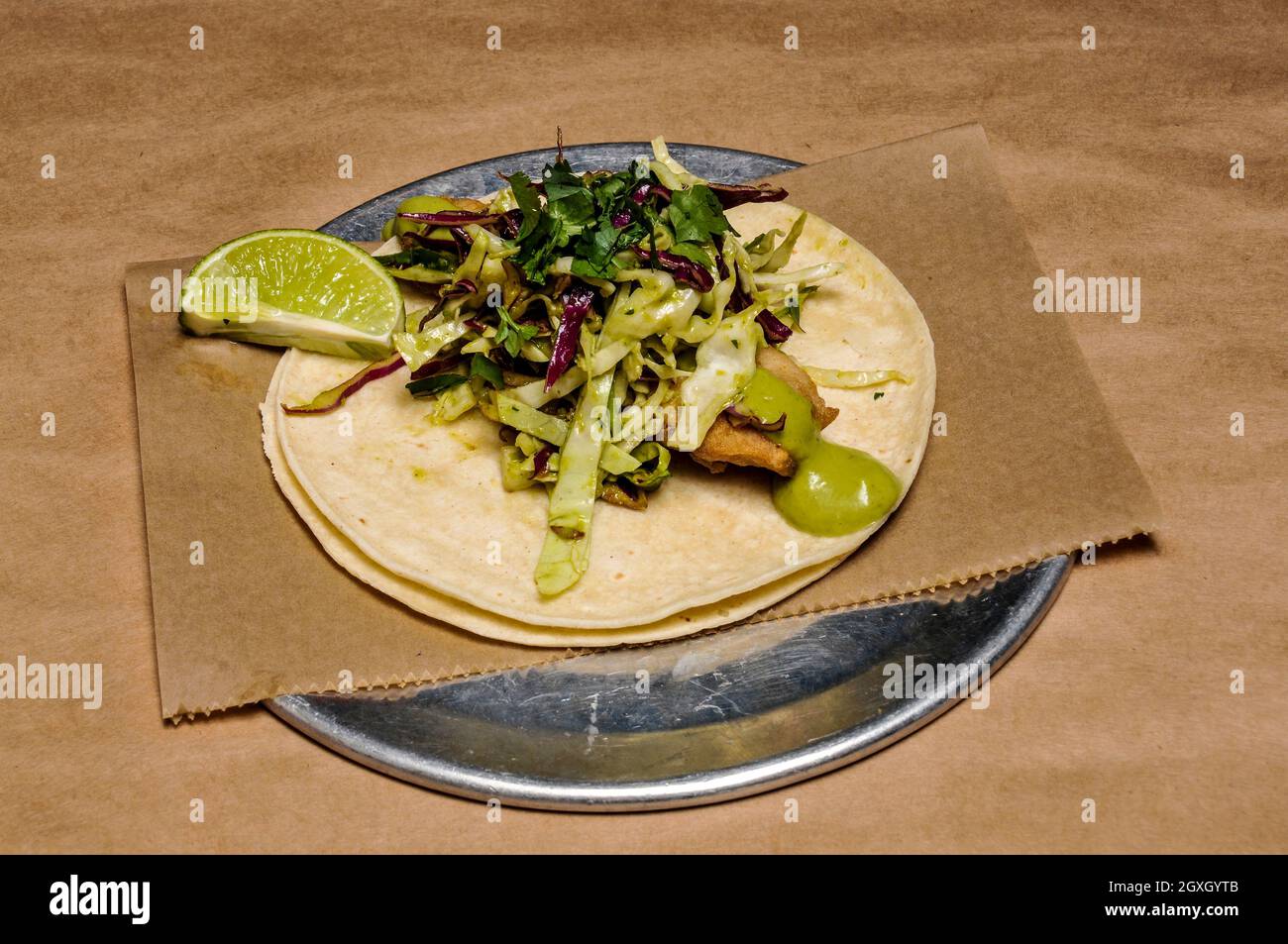 Authentic tex mex mexican cuisine known as a fish Taco Stock Photo - Alamy
