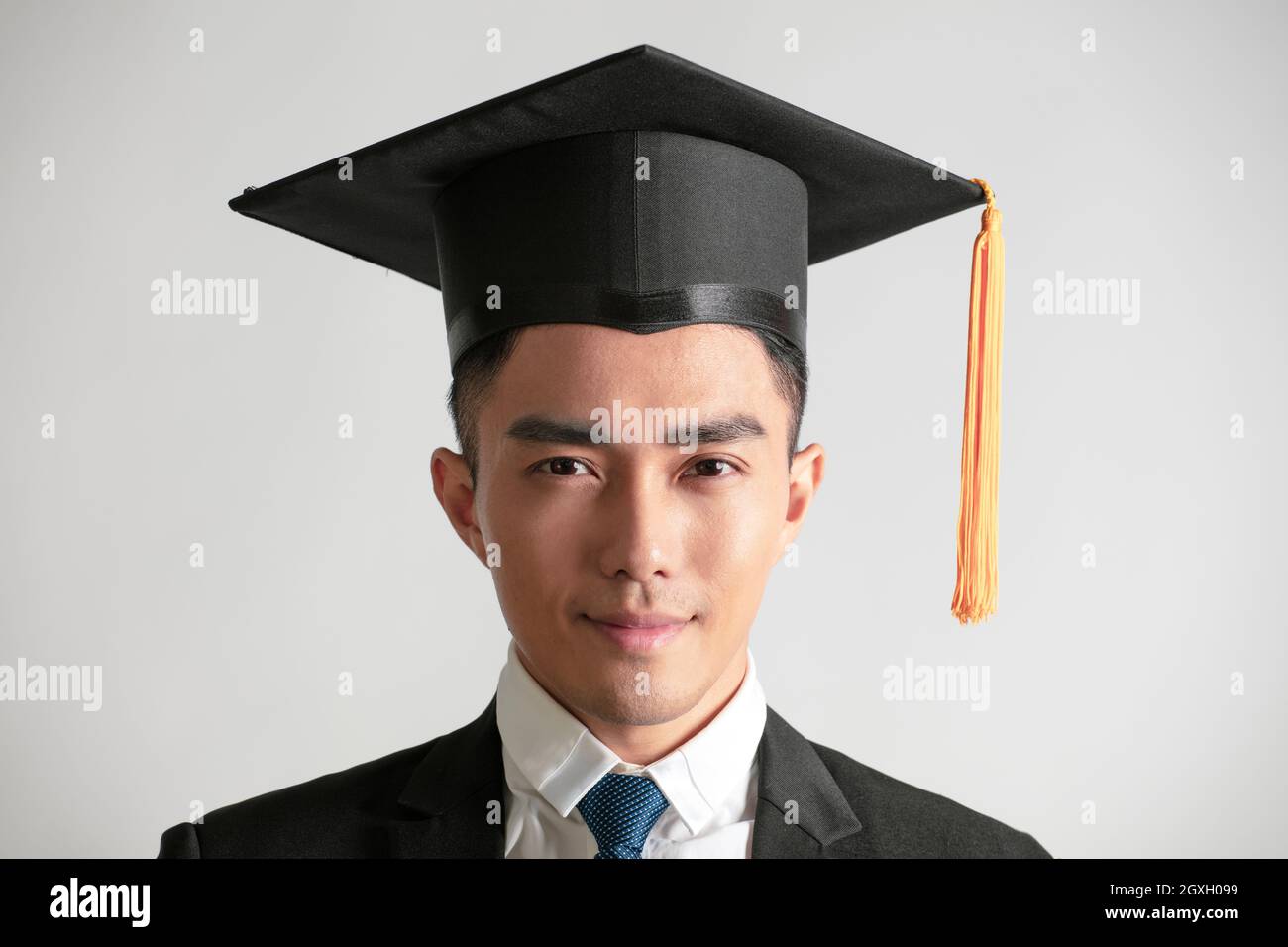 Closeup confident young handsome graduation man face Stock Photo - Alamy
