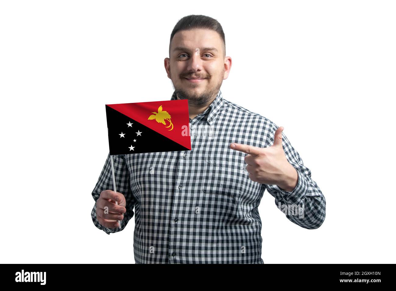 White guy holding a flag of Papua New Guinea and points the finger of ...