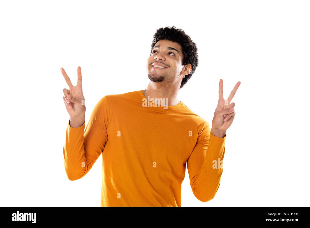 Afro guy making the victory sign isolated on a white background Stock ...