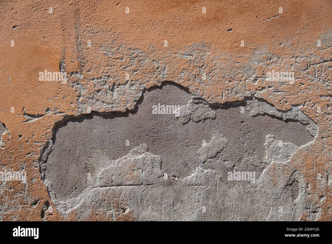 A stucco textured background on the wall of an old building in Rome ...