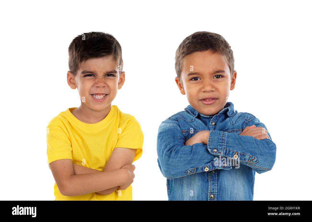 Two funny children pretending to be angry isolated on a white ...