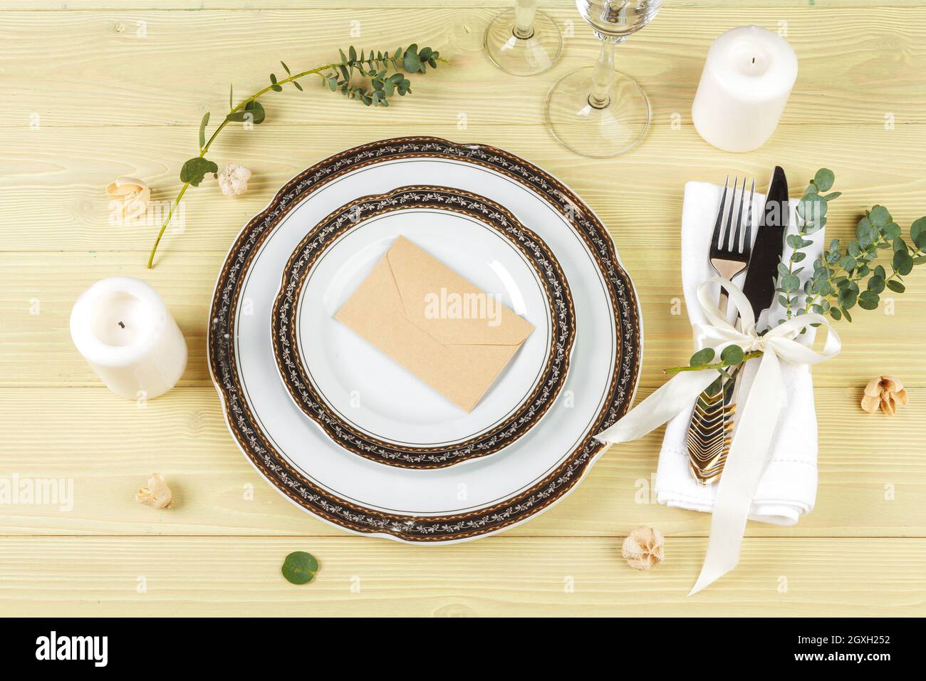 Table with plates and cutlery, view from above Stock Photo - Alamy