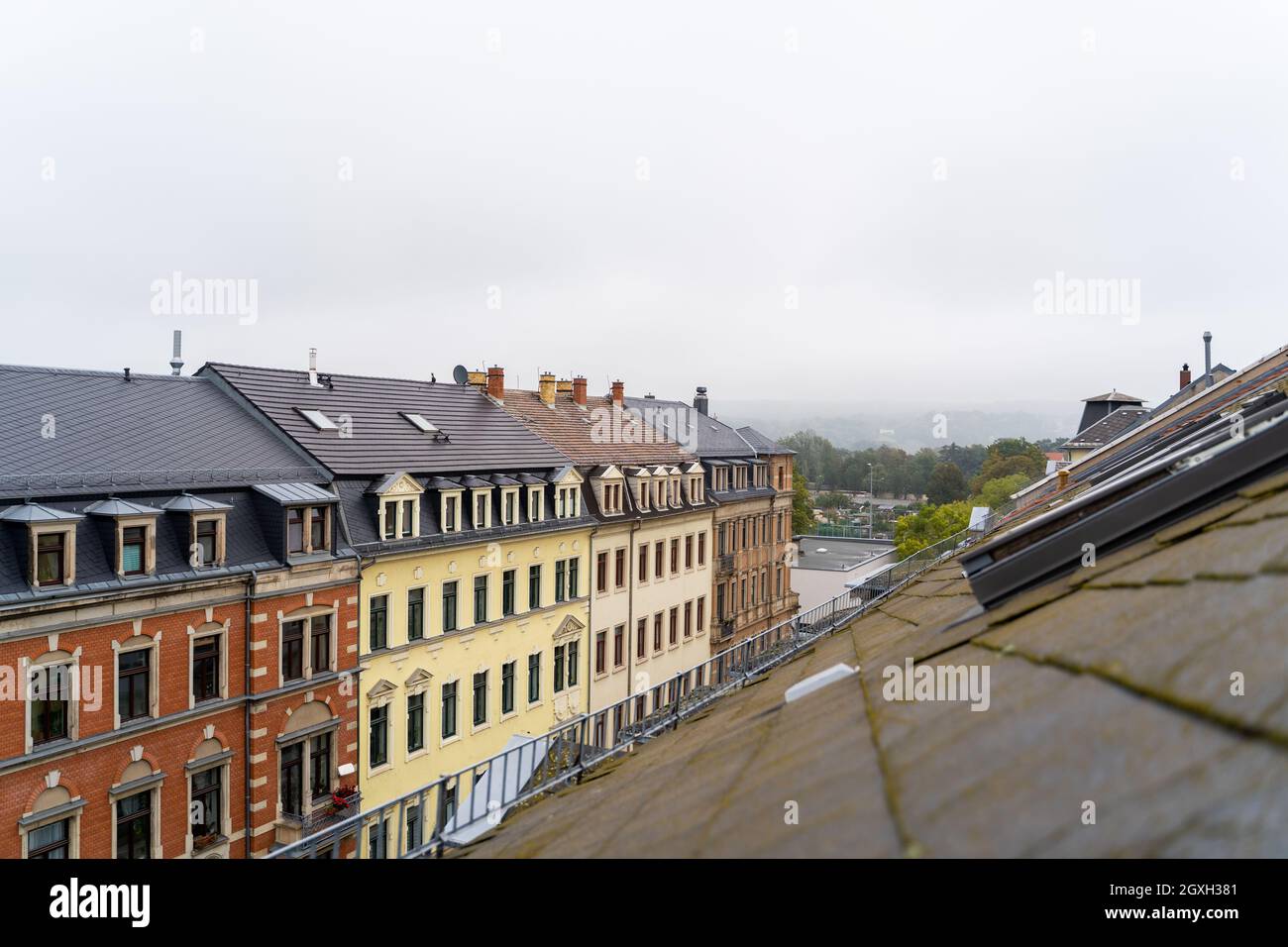 Downtown apartment buildings colorful rooftops hi-res stock photography ...