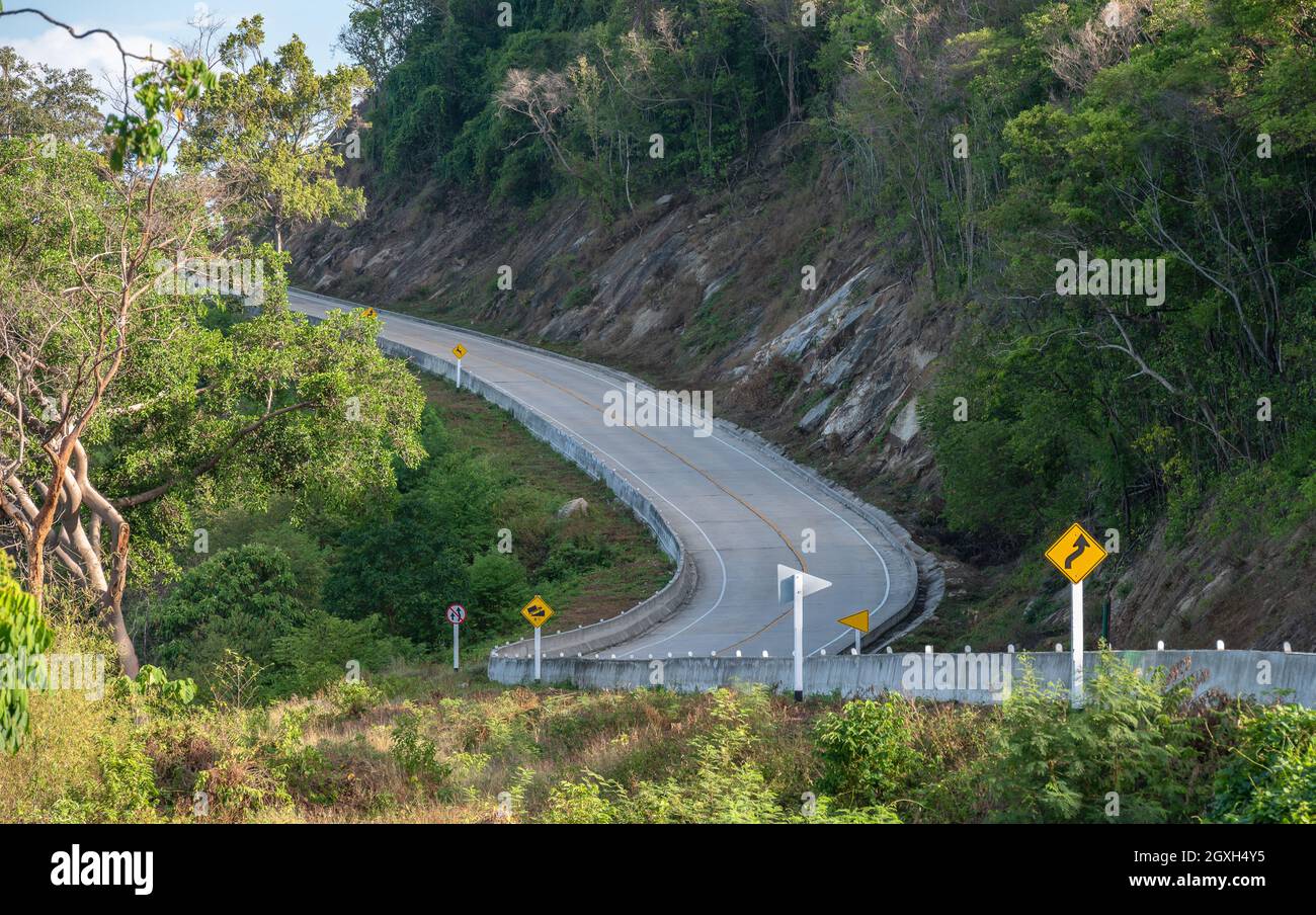 Road turning in rainforest mountains Stock Photo - Alamy