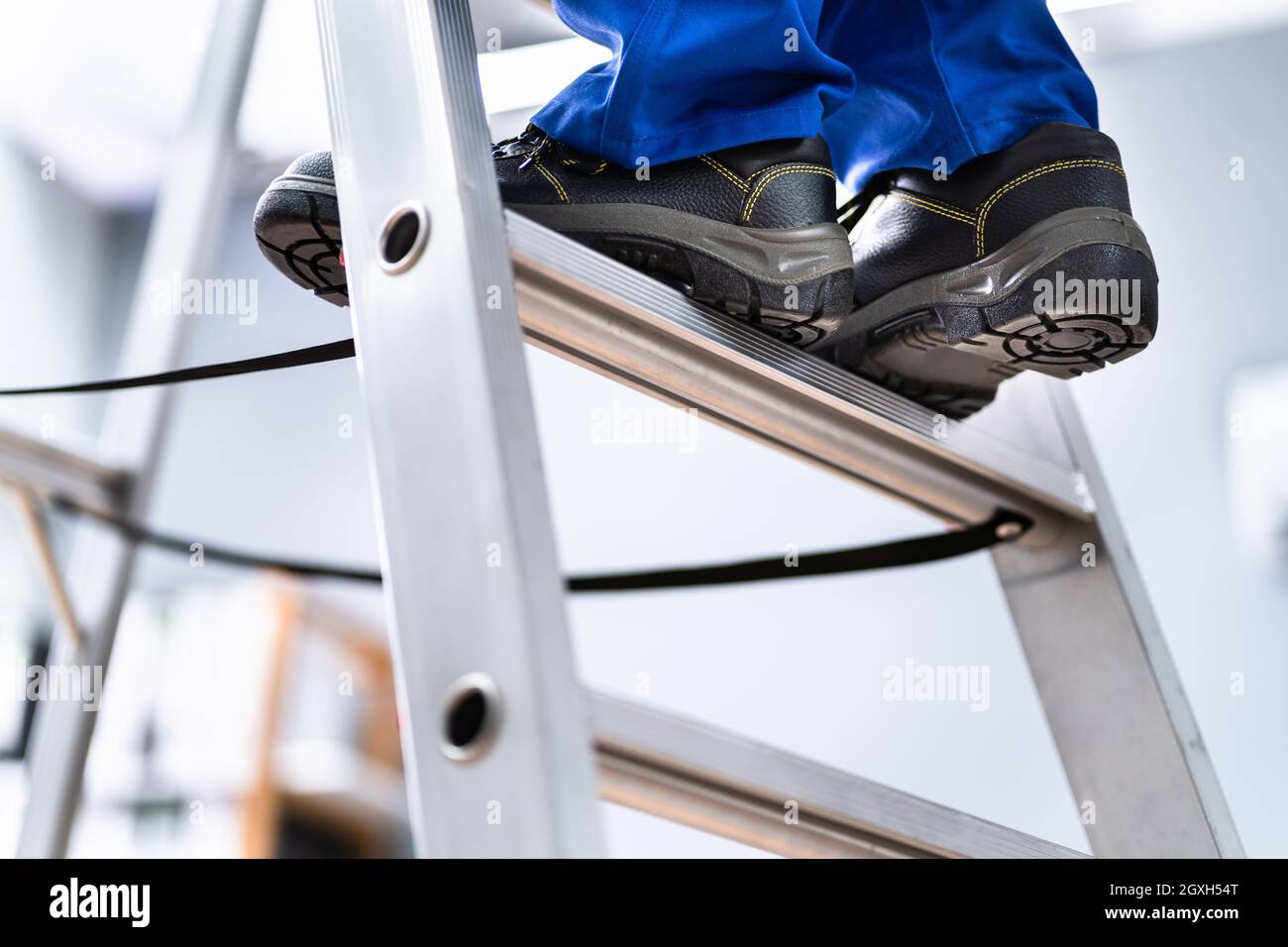 Older man up ladder hi-res stock photography and images - Alamy