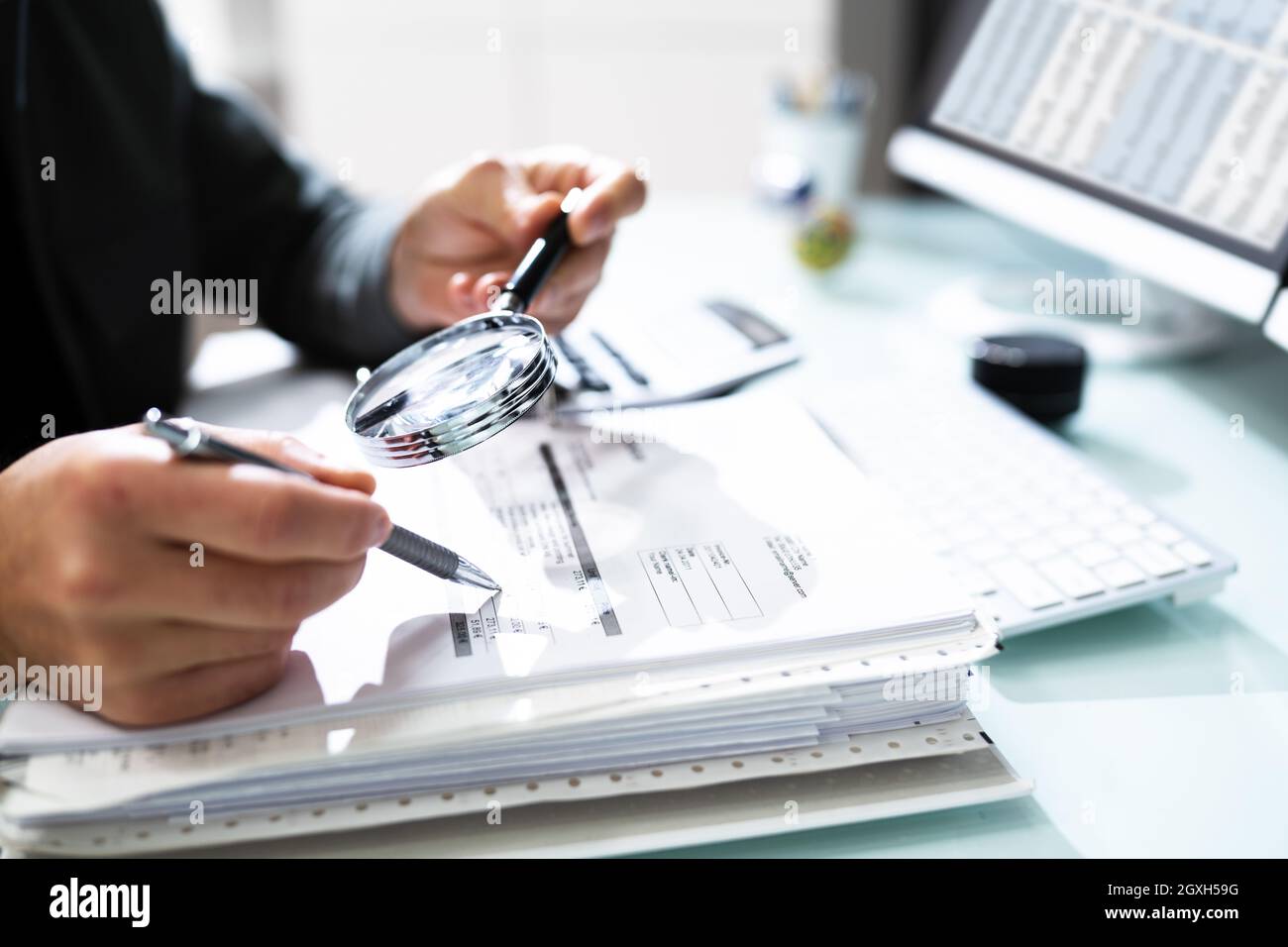Audit And Fraud Investigation. Auditor Using Magnifying Glass On ...