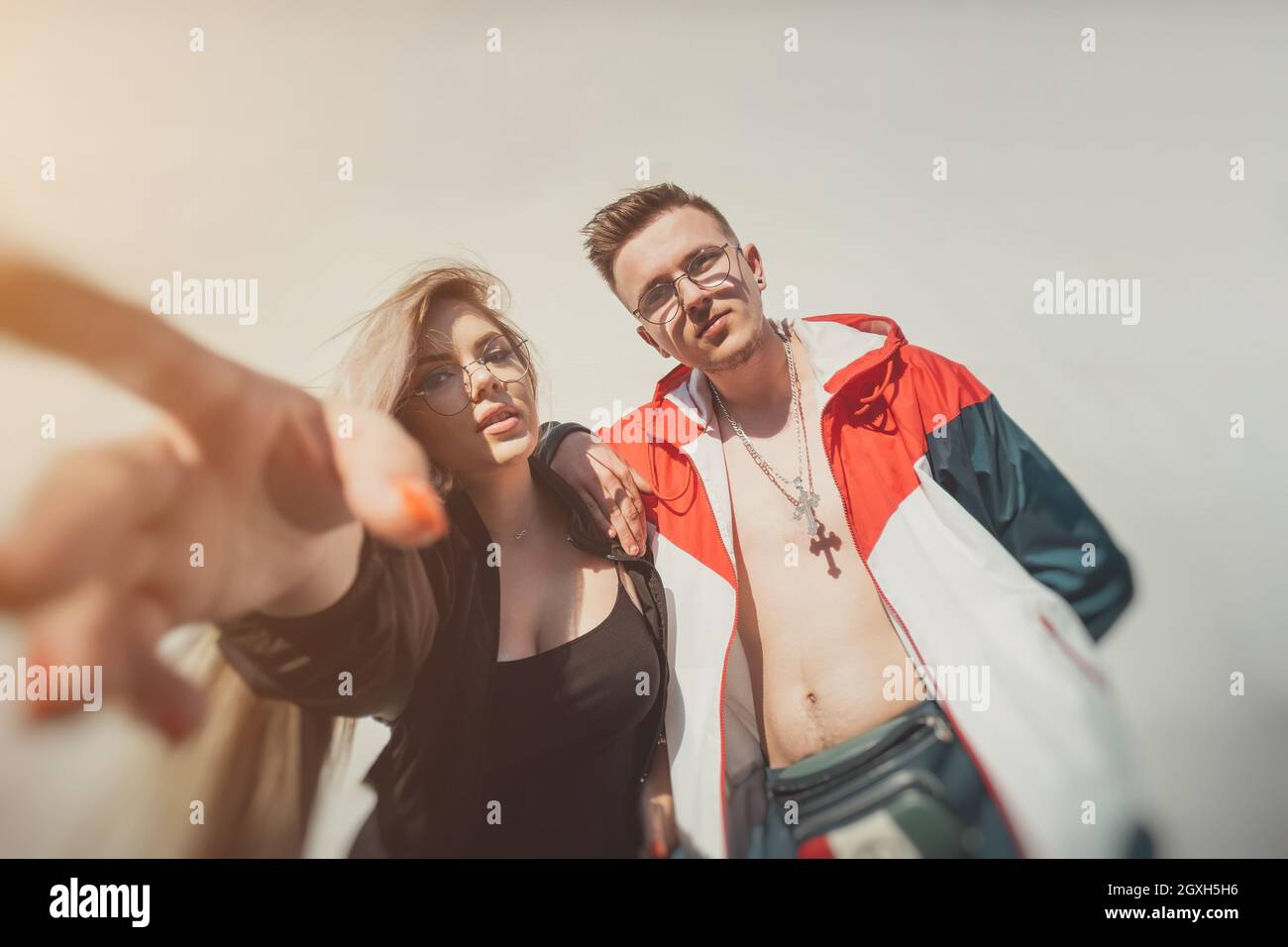 Trendy urban couple taking a selfie, young people lifestyle Stock Photo ...