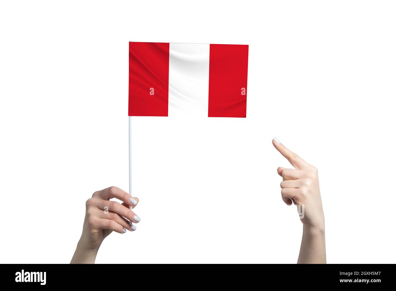 A beautiful female hand holds a Peru flag to which she shows the finger ...