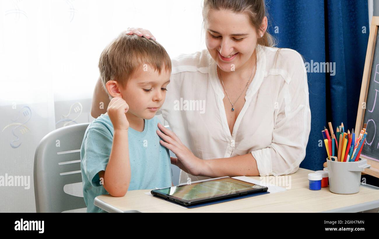 Preschool teacher child hugging hi-res stock photography and images - Alamy