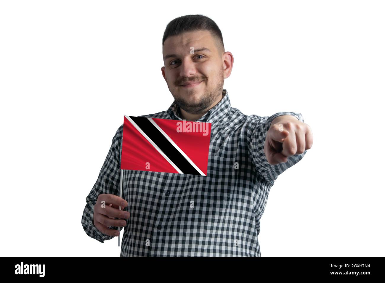 White guy holding a flag of Trinidad and Tobago and points forward in ...