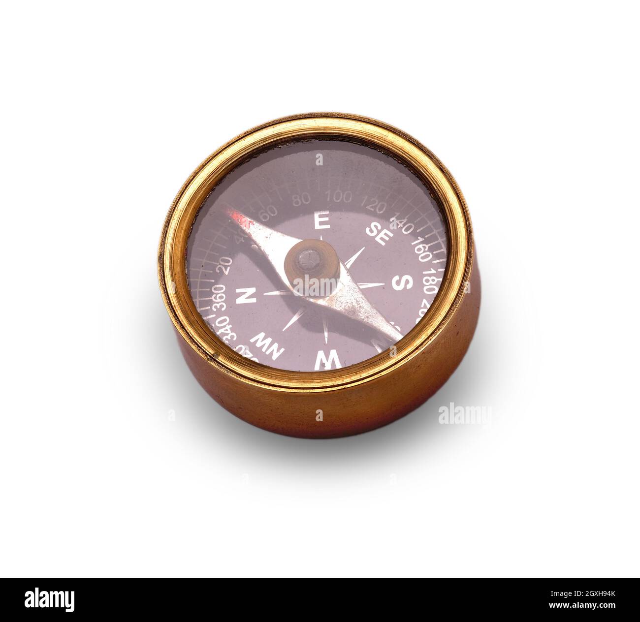 old compass cut out on white background Stock Photo - Alamy