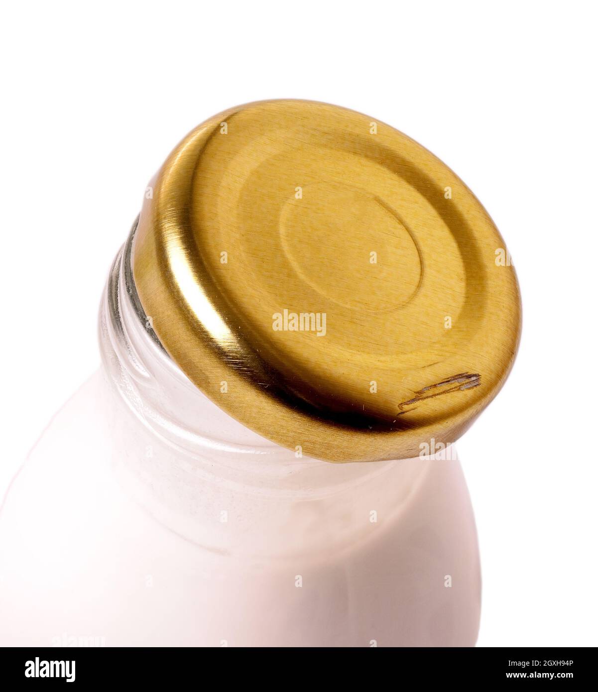 opened milk glass bottle with metal lid on the white background Stock ...