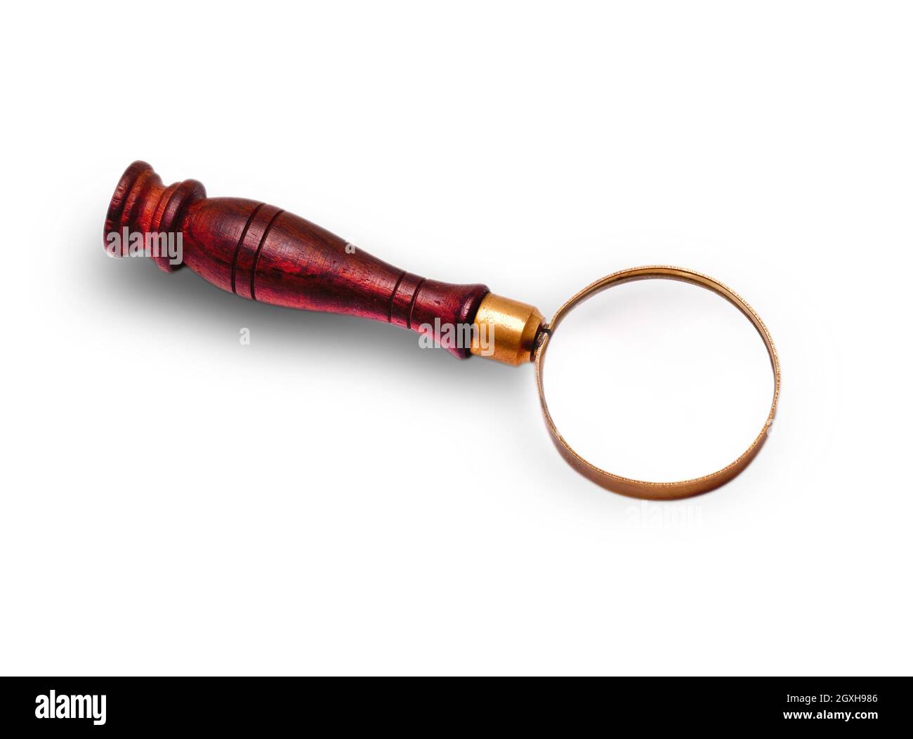 the old Magnifier carved on a white background Stock Photo - Alamy