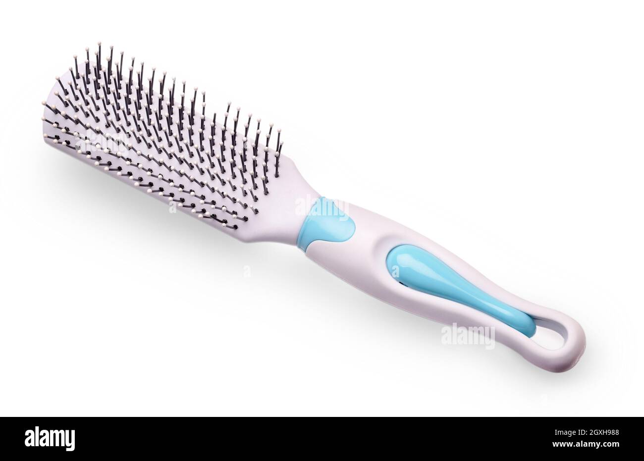 white massage plastic comb on the white background Stock Photo - Alamy