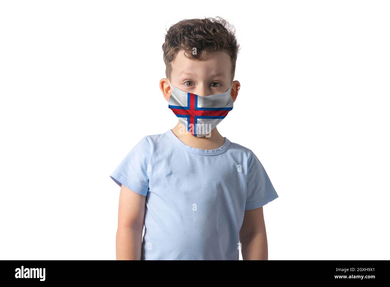 Respirator with flag of Faroe Islands. White boy puts on medical face ...