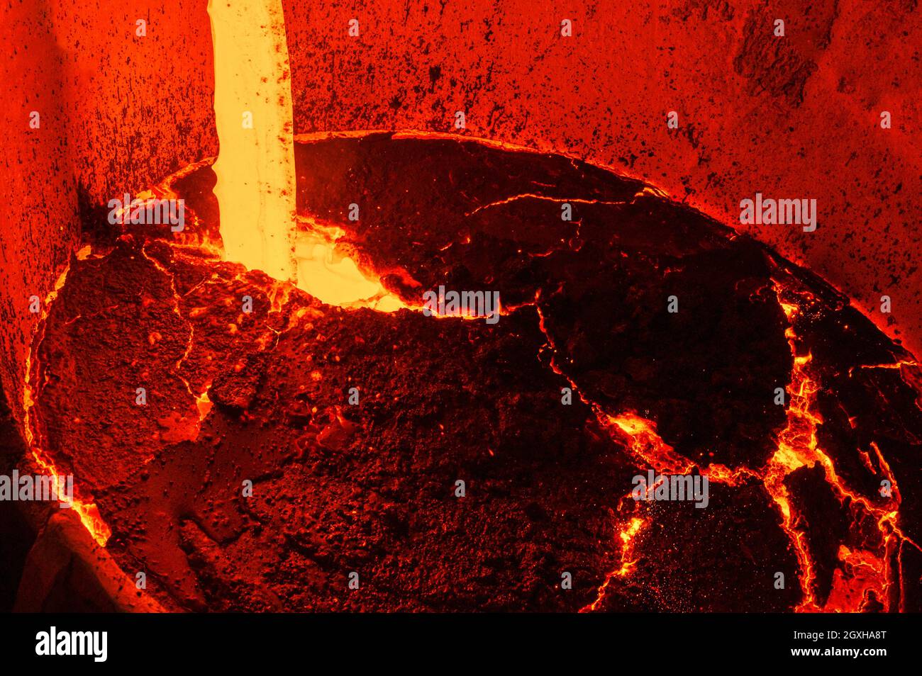 Liquid molten metal is poured into the ladle Stock Photo - Alamy
