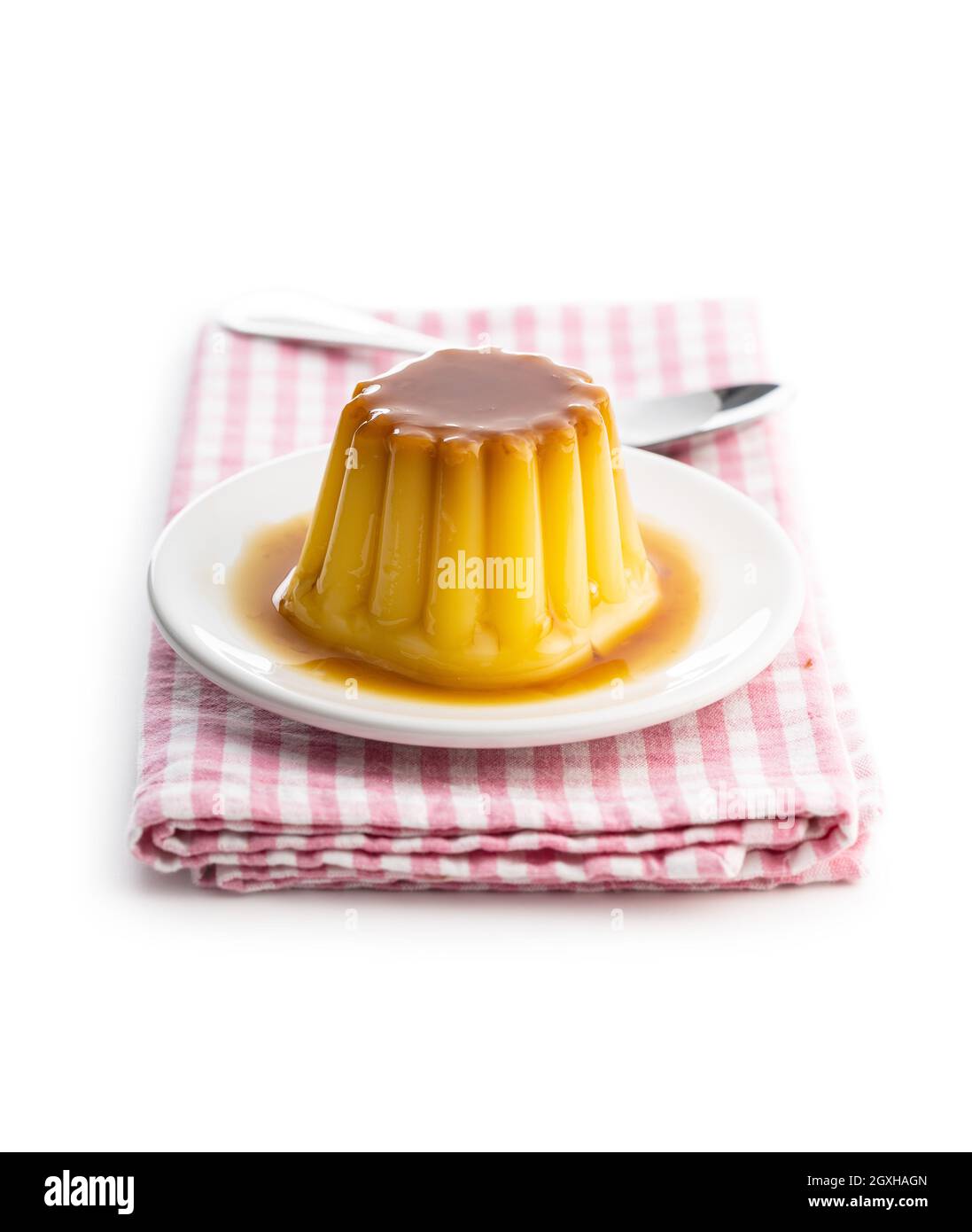 Sweet vanilla pudding. Sweet dessert with caramel topping isolated on ...
