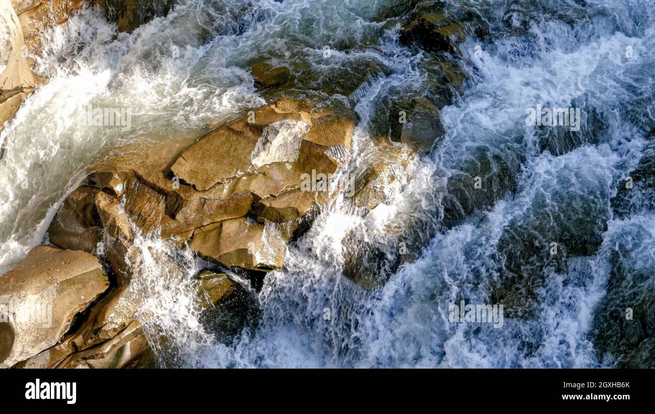 Fast powerful river stream on the waterfall cascade at mountains Stock ...