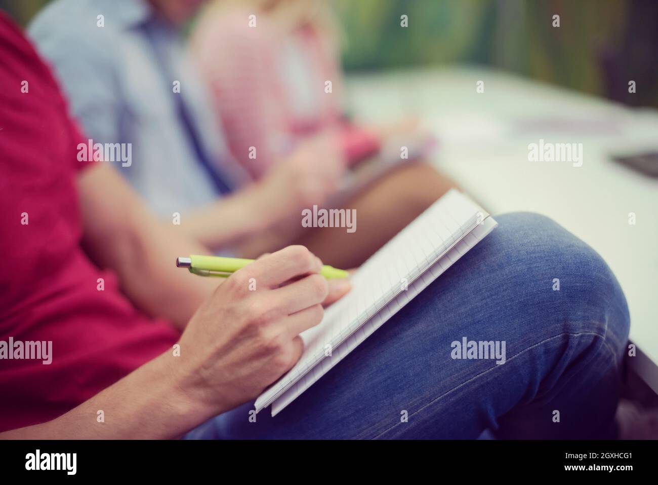Adult students taking test in hi-res stock photography and images - Alamy