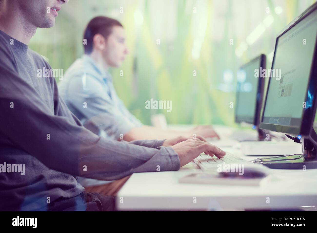 technology students group in computer lab school classroom working on ...