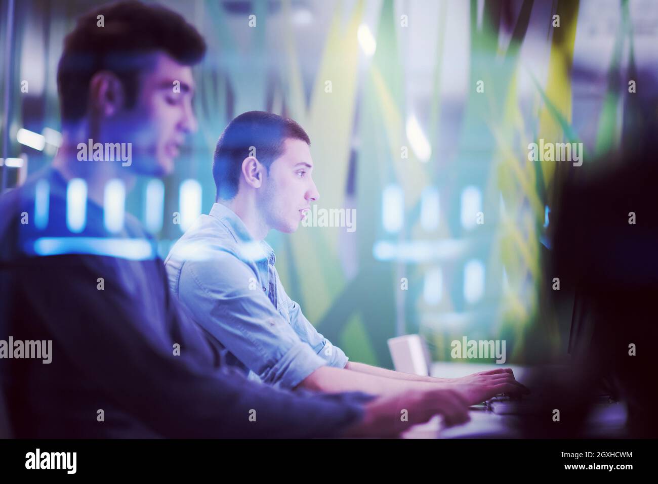 technology students group in computer lab school classroom working on ...