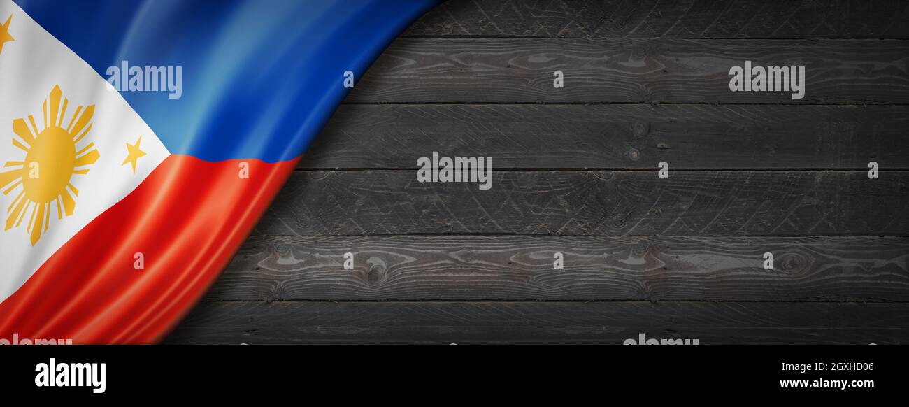 Philippines flag on black wood wall. Horizontal panoramic banner Stock ...