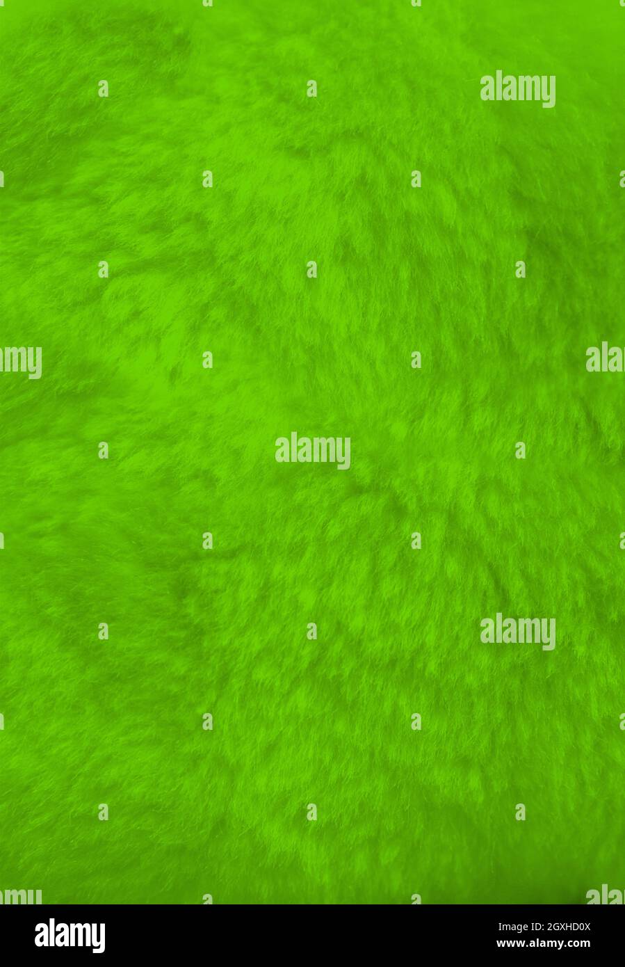 Green fur background close up view. Texture wallpaper Stock Photo - Alamy