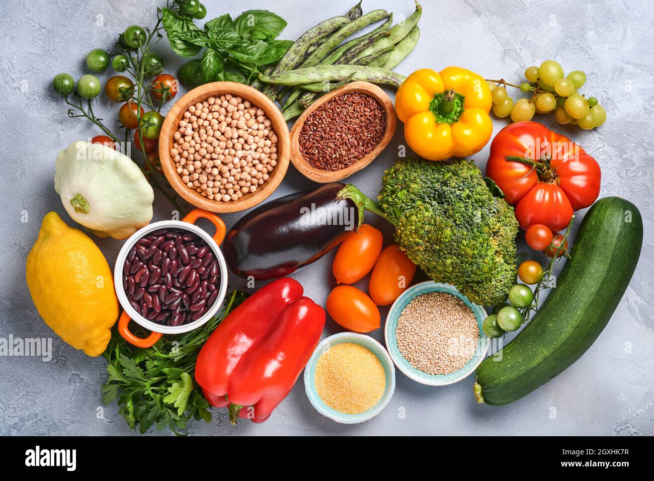 Assortment of fresh fruits and organic multicolored rainbow vegetables ...