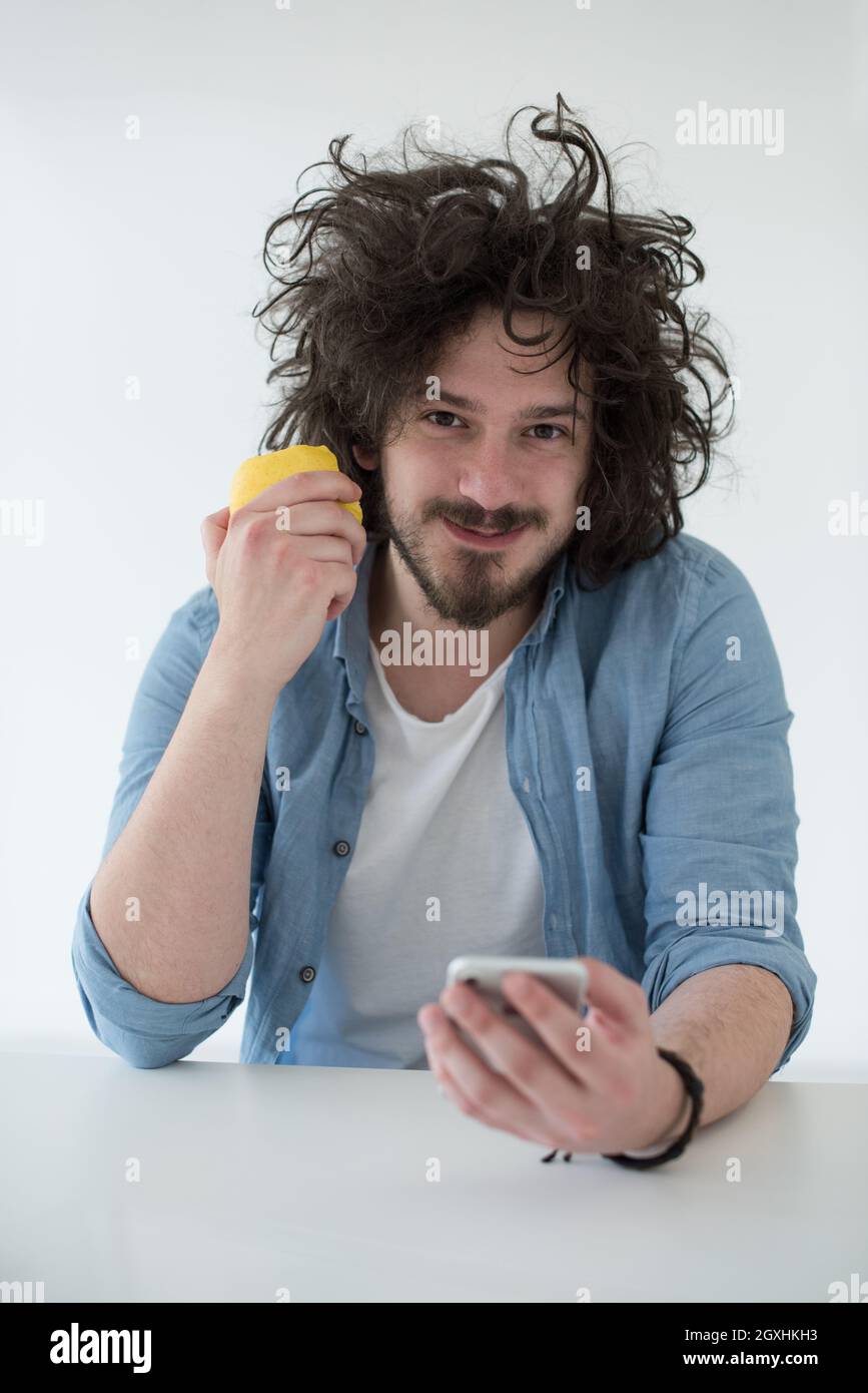 Apple man eating reading hi-res stock photography and images - Alamy