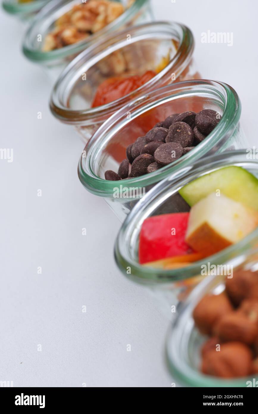 nuts and dry fruits mix healthy organic food mix in glass bowls ...