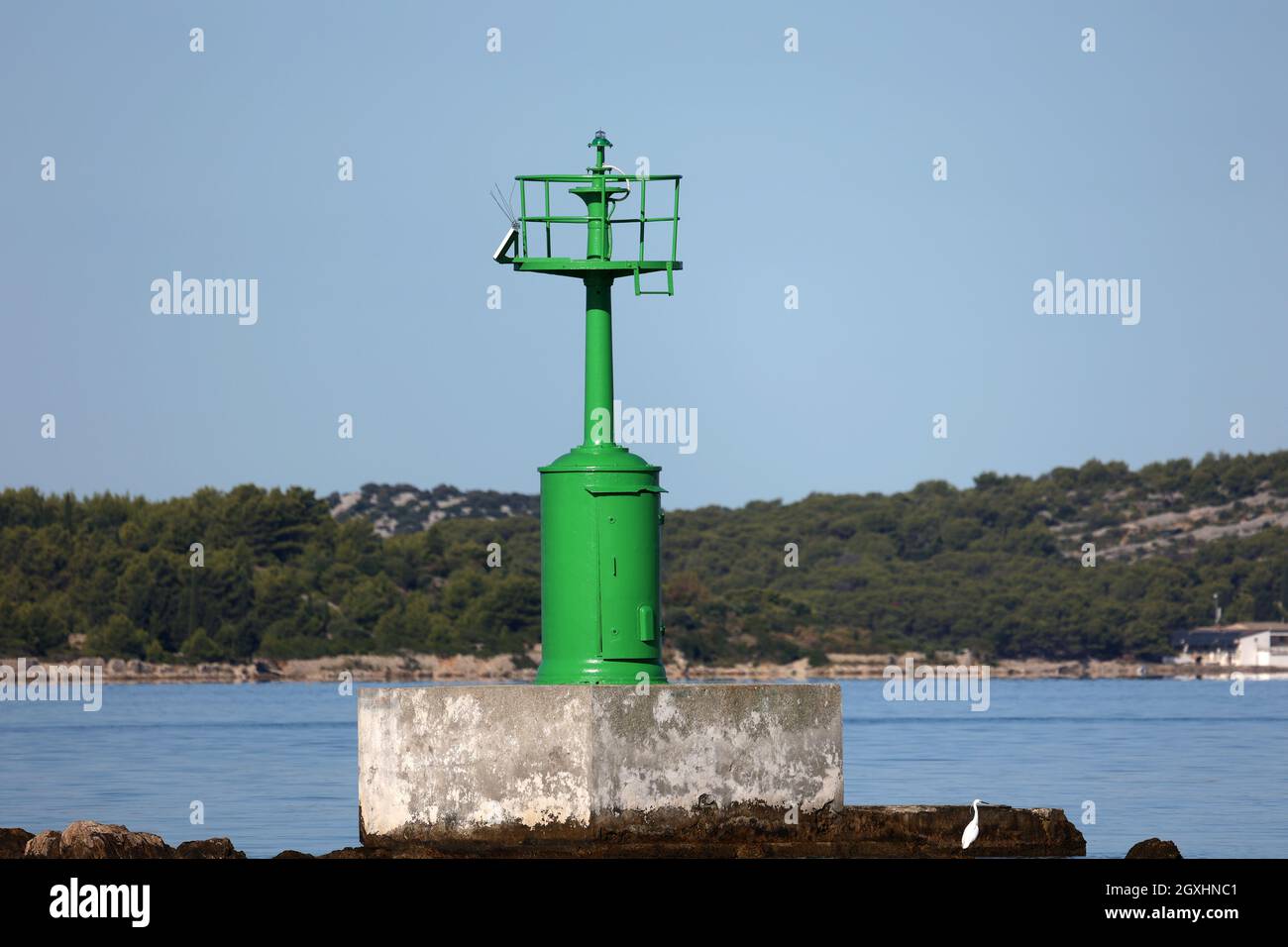 Small beacon at the pier in Croatia Stock Photo - Alamy