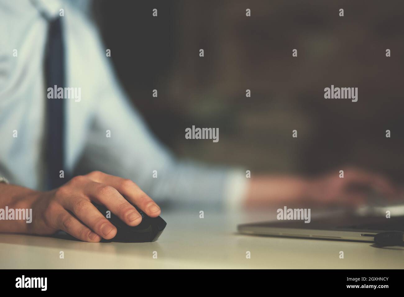 Hand using computer mouse at office closeup Stock Photo - Alamy