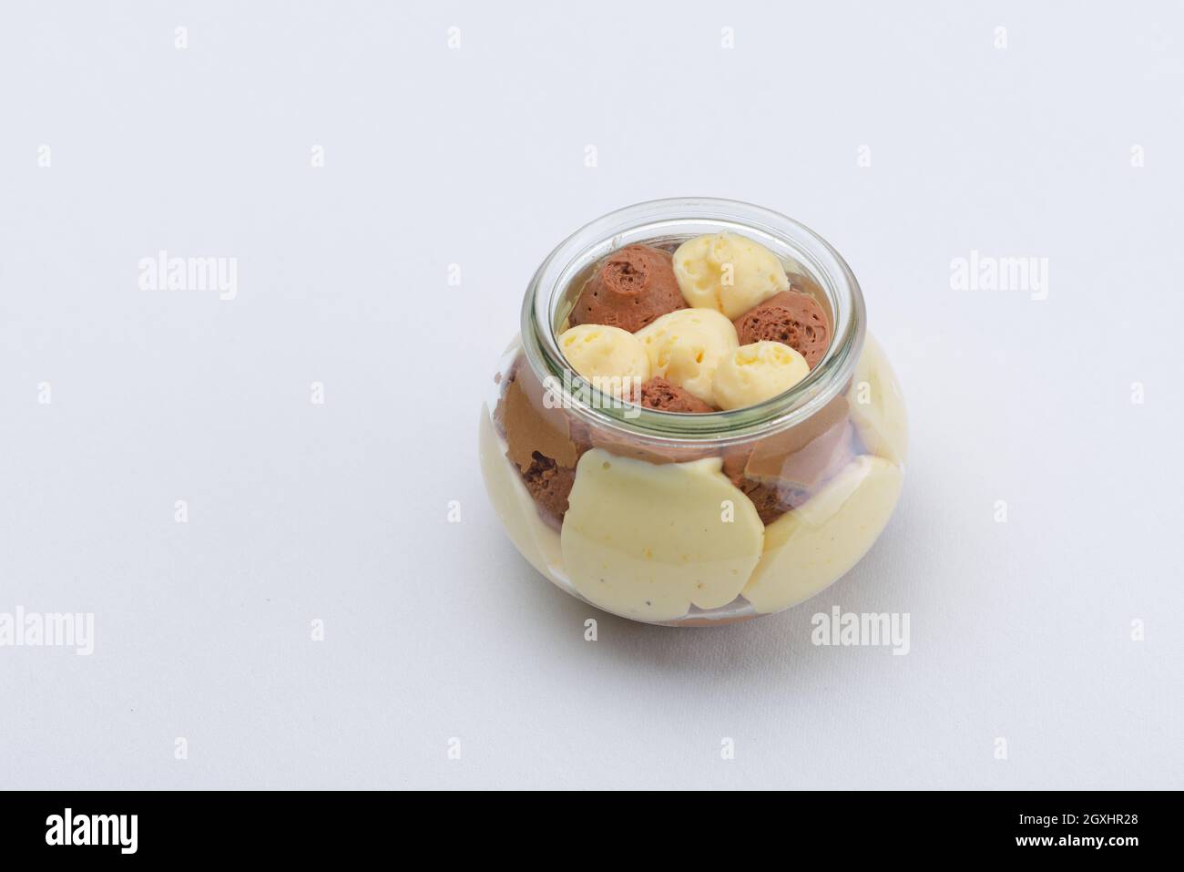 tasty dessert glass cup with fruits and chocolate Stock Photo - Alamy